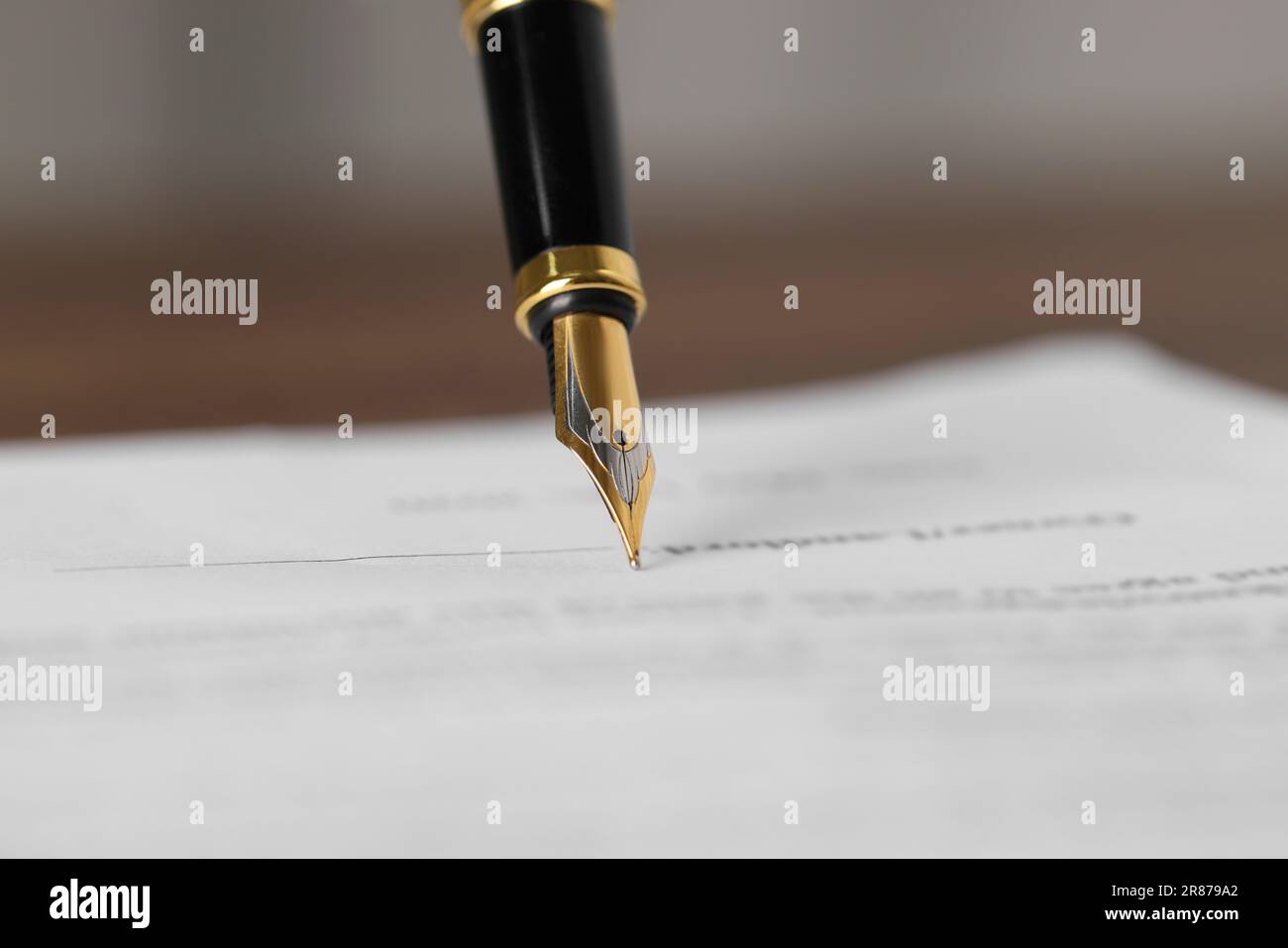 Writing on document with fountain pen, closeup. Notary contract Stock ...