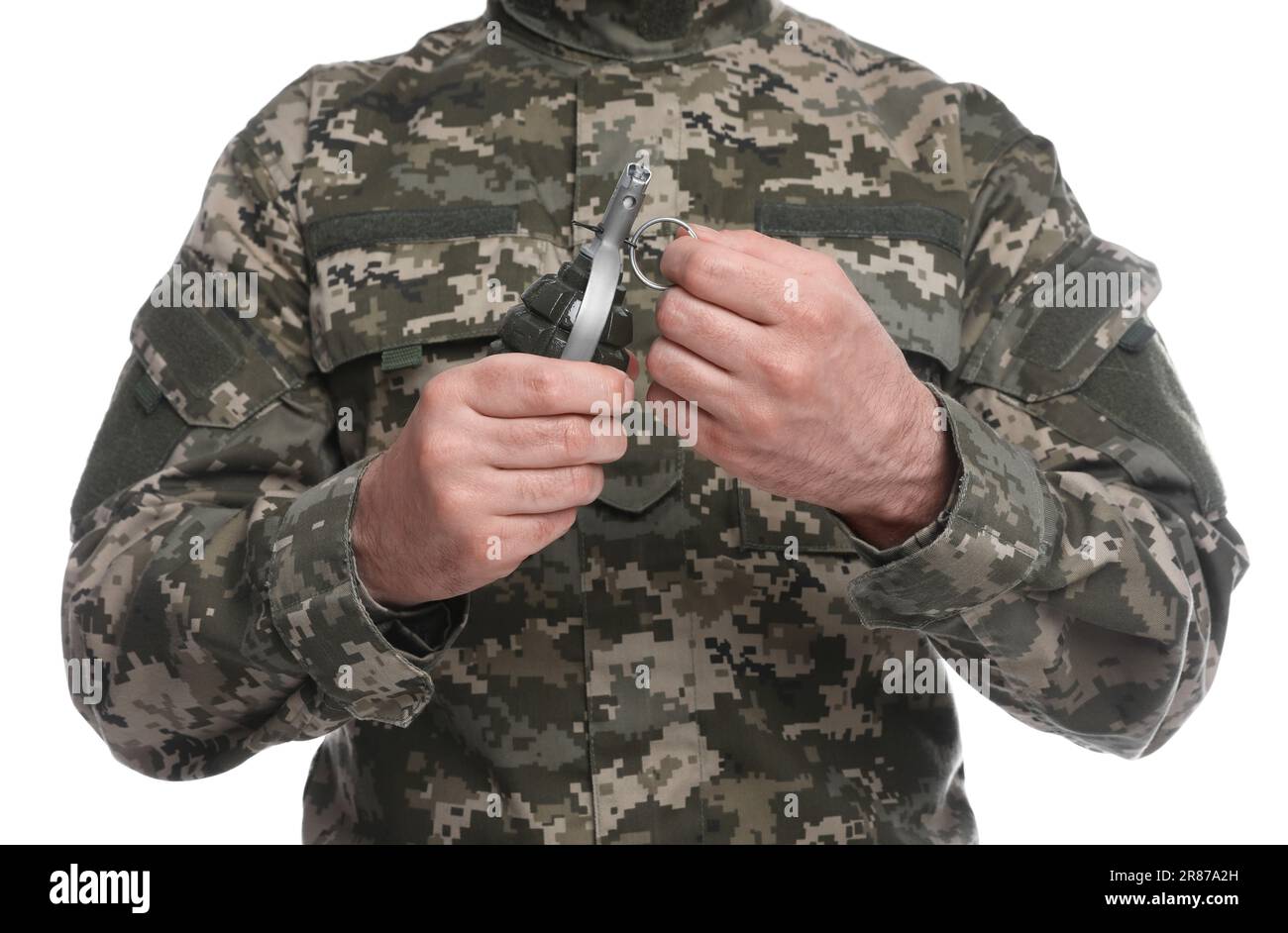Soldier pulling safety pin out of hand grenade on white background ...