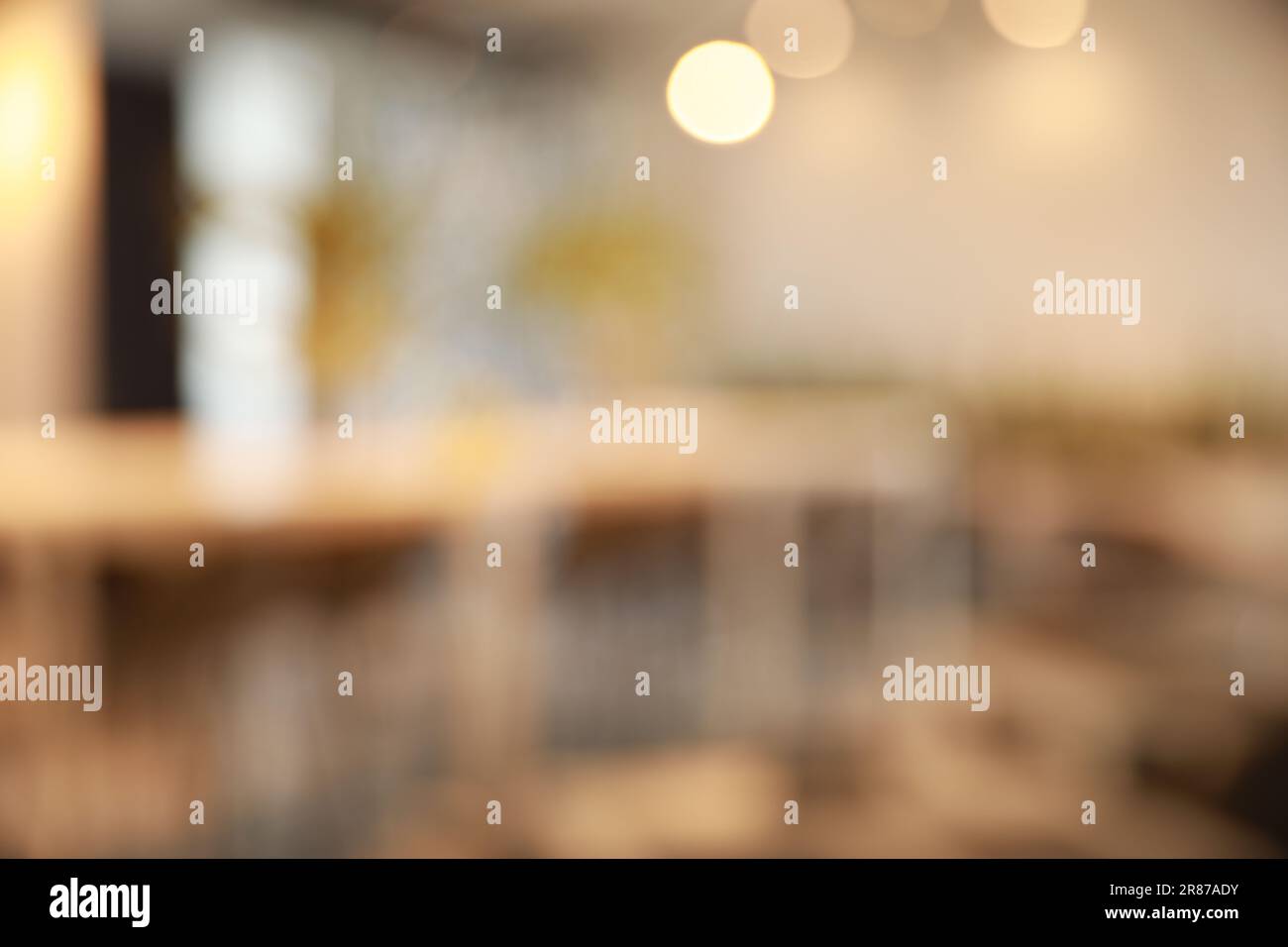 Blurred view of beautiful modern cafe interior Stock Photo - Alamy