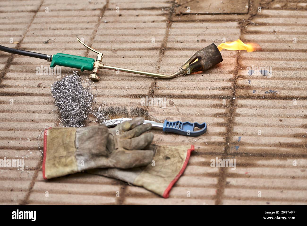 Blow torch gloves hi-res stock photography and images - Alamy
