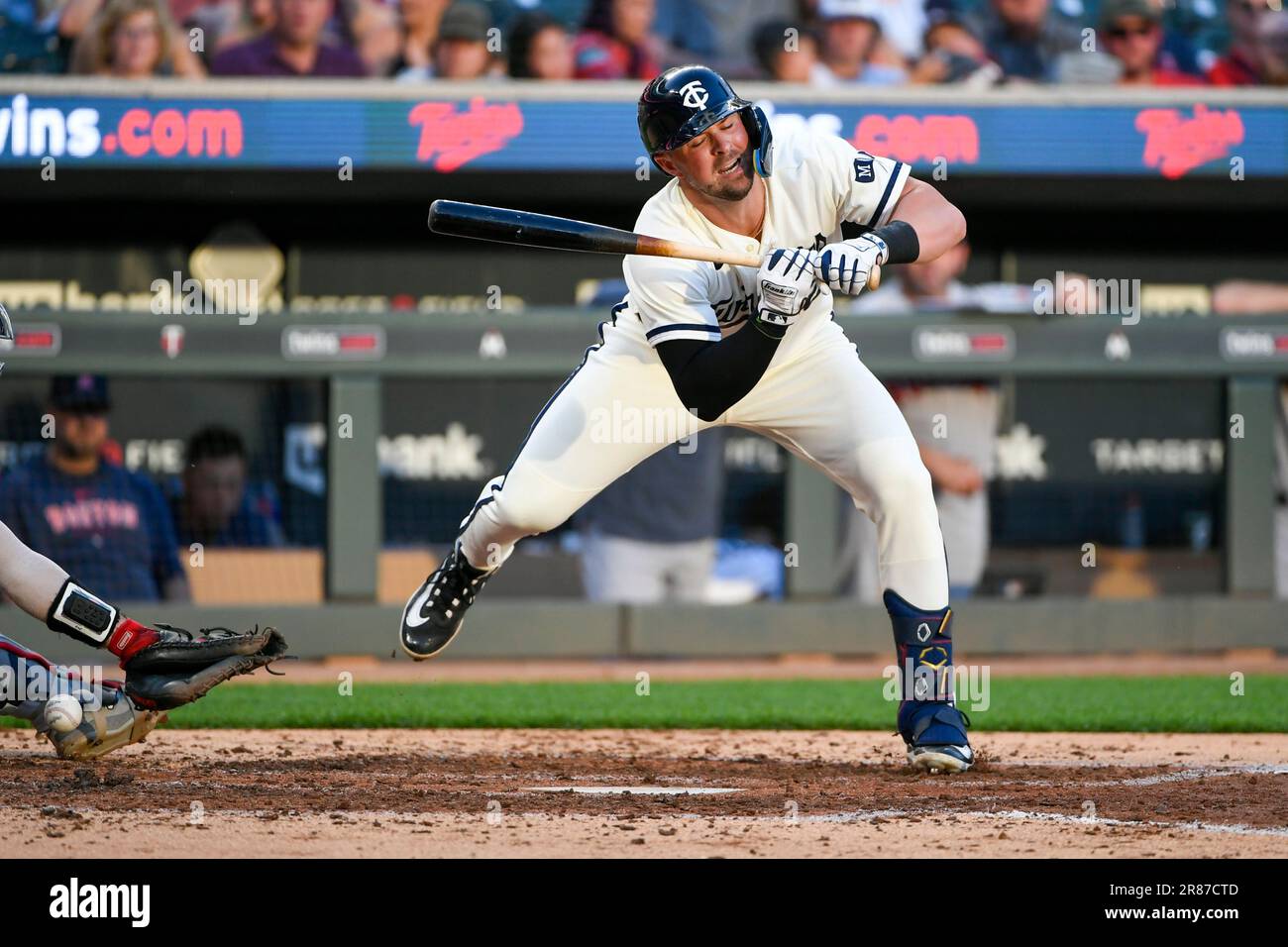 Minnesota Twins' Kyle Farmer is hit by a throw from Boston Red Sox ...
