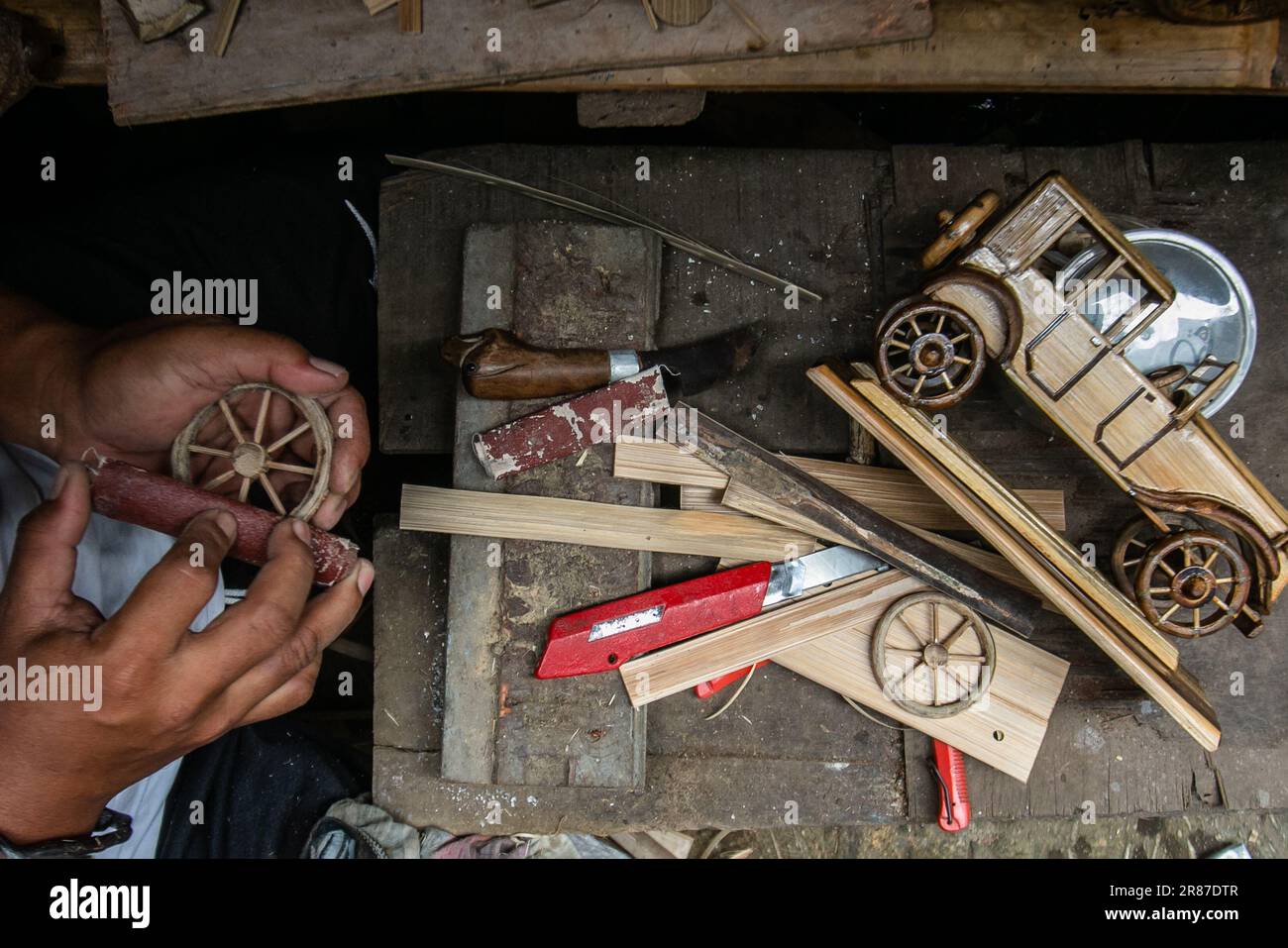 Bogor, Indonesia. 17th June, 2023. A craftsman makes automotive ...