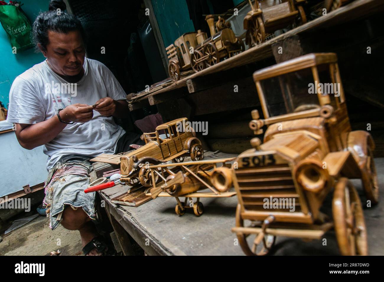 Bogor, Indonesia. 17th June, 2023. A craftsman makes automotive ...