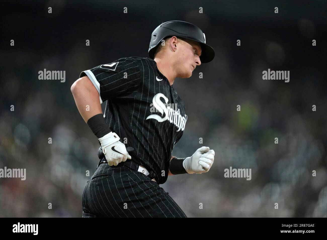 Chicago White Sox's Andrew Vaughn rounds first after his home run off ...