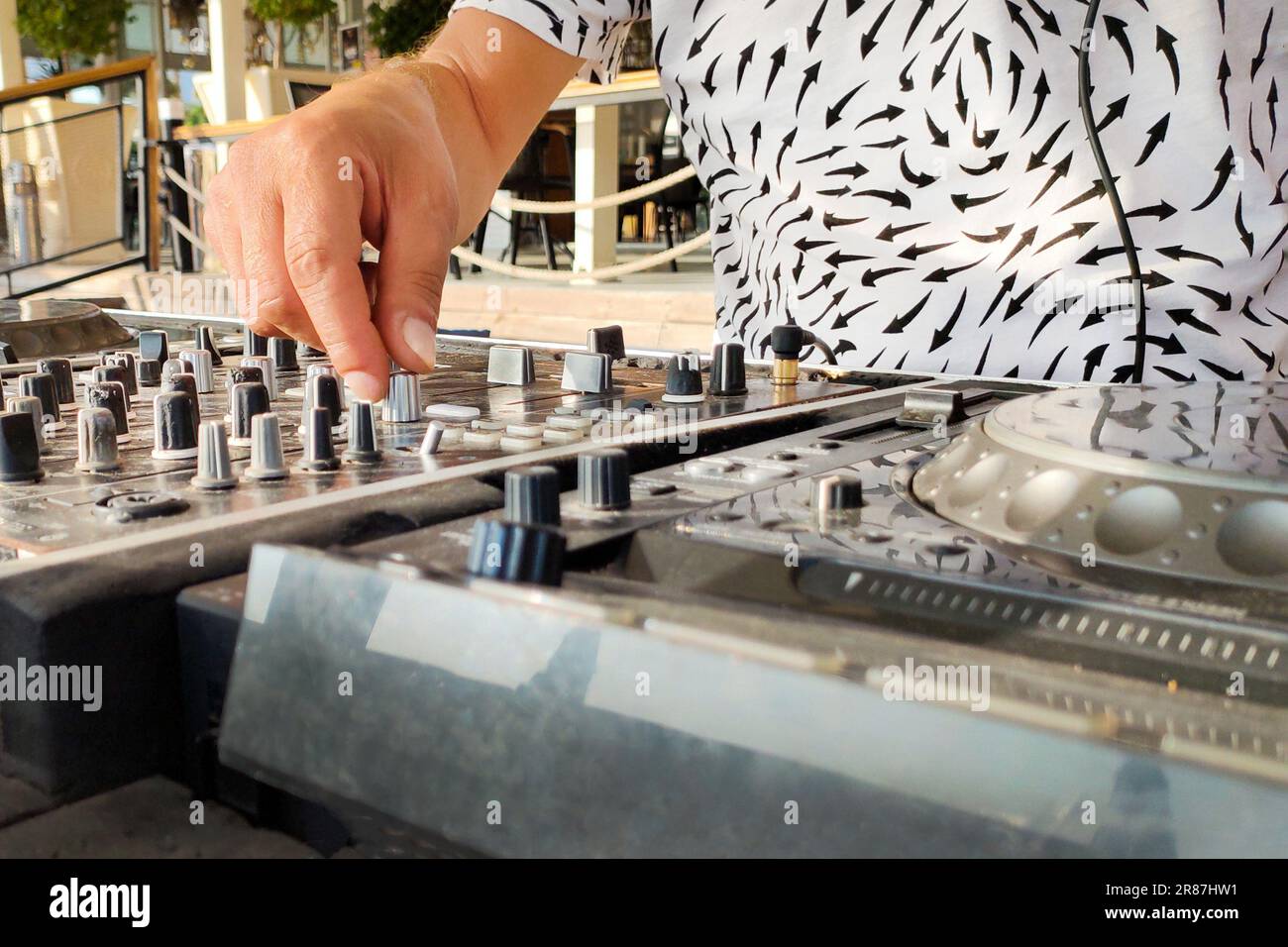 Turkey, Alanya - August 12, 2022: DJ creates music on mixing player ...