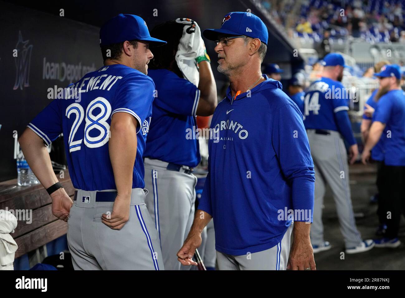 Toronto Blue Jays bench coach Don Mattingly, right, talks with second ...