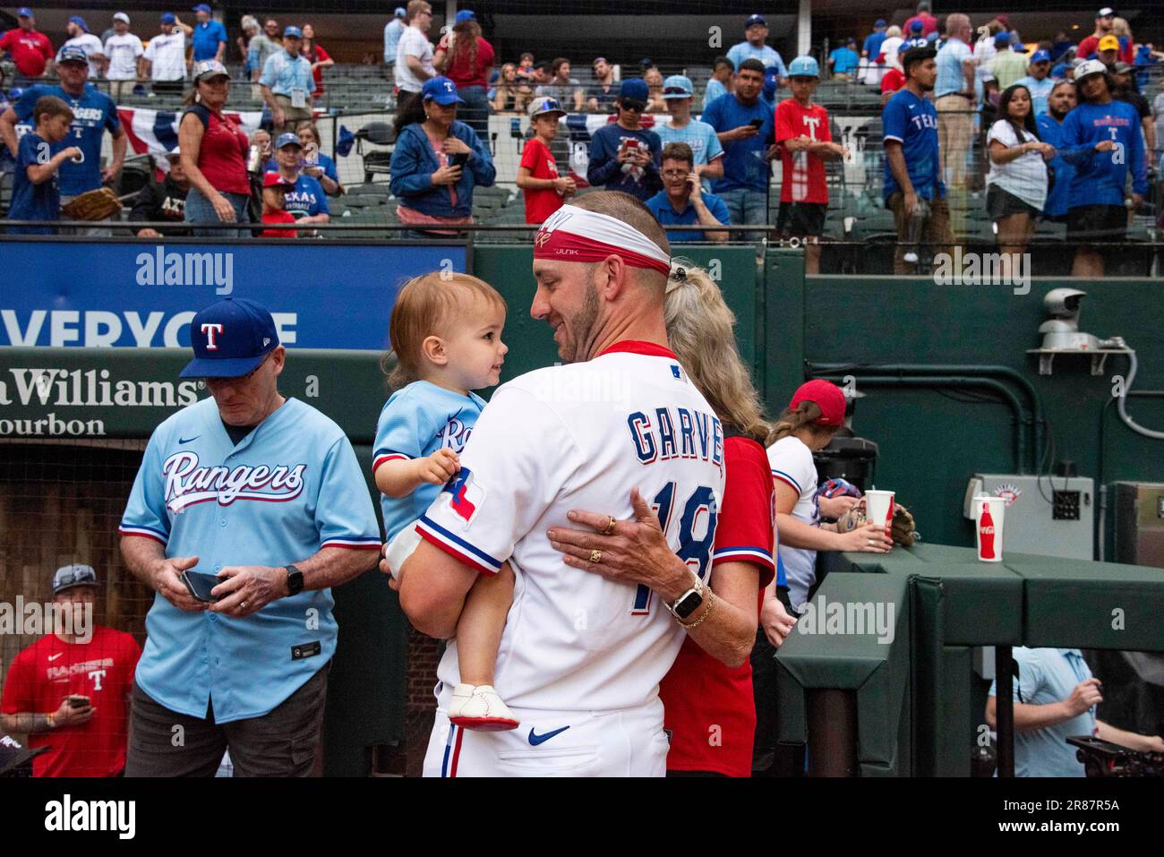 Texas Rangers catcher Mitch Garver (18), smiles at his son, Gamble ...
