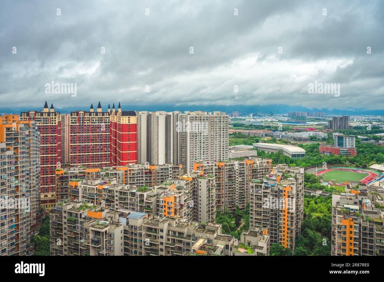 Cloudy weather in a city residential building Stock Photo - Alamy