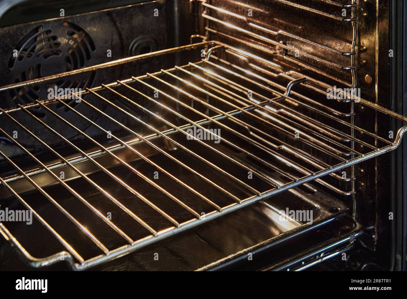 Chrome Elegance: Sleek Grill and Drip Tray Define the Allure of the ...