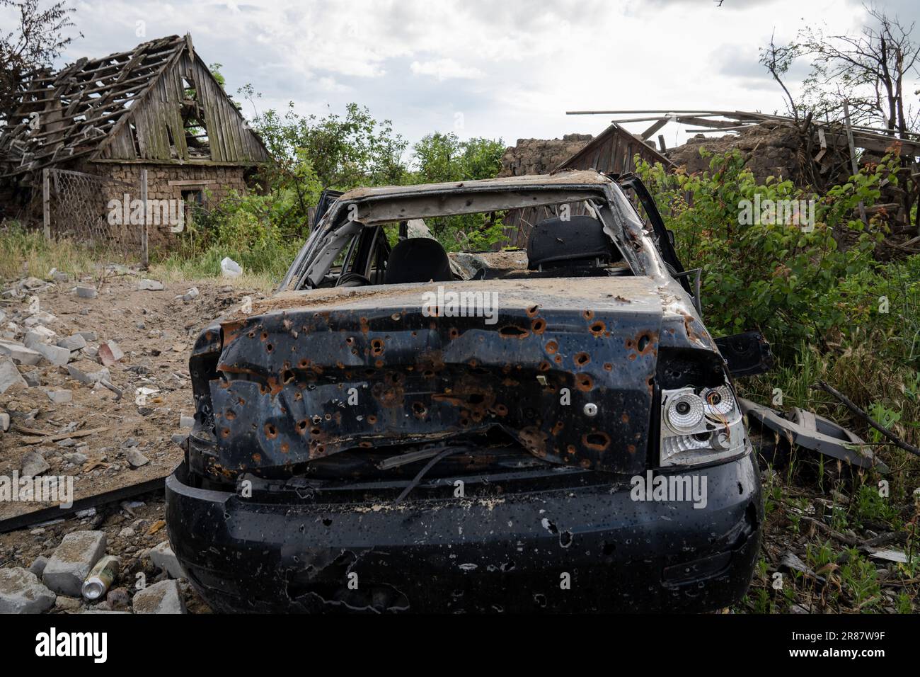 Ukraine. 17th June, 2023. A vehicle with shrapnel marks is seen outside ...