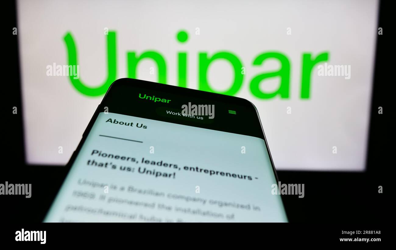 Mobile phone with website of Brazilian company Unipar Carbocloro S.A ...