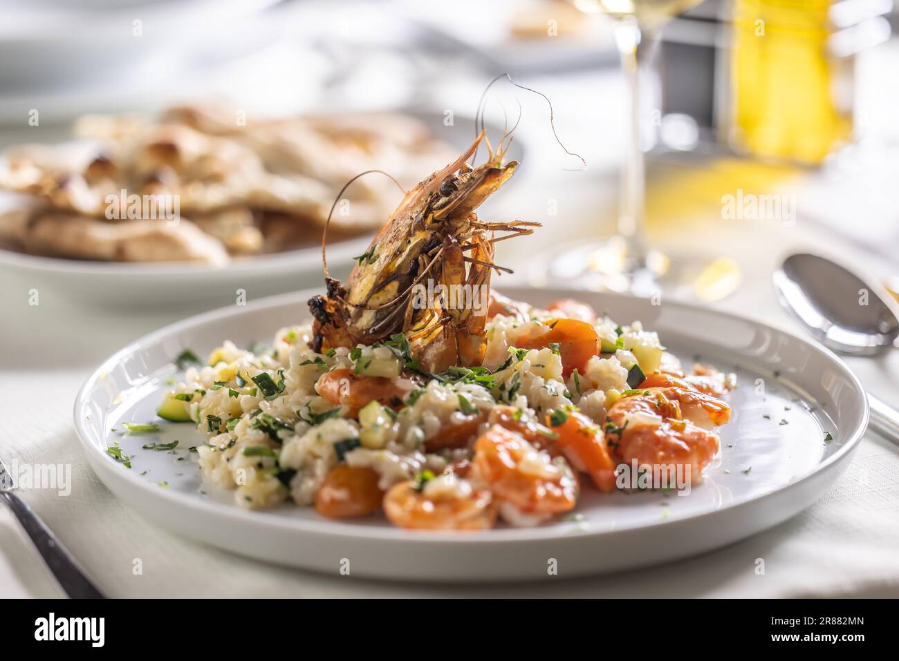 Schrimp and courgette risotto Italian style with a decorative tiger ...