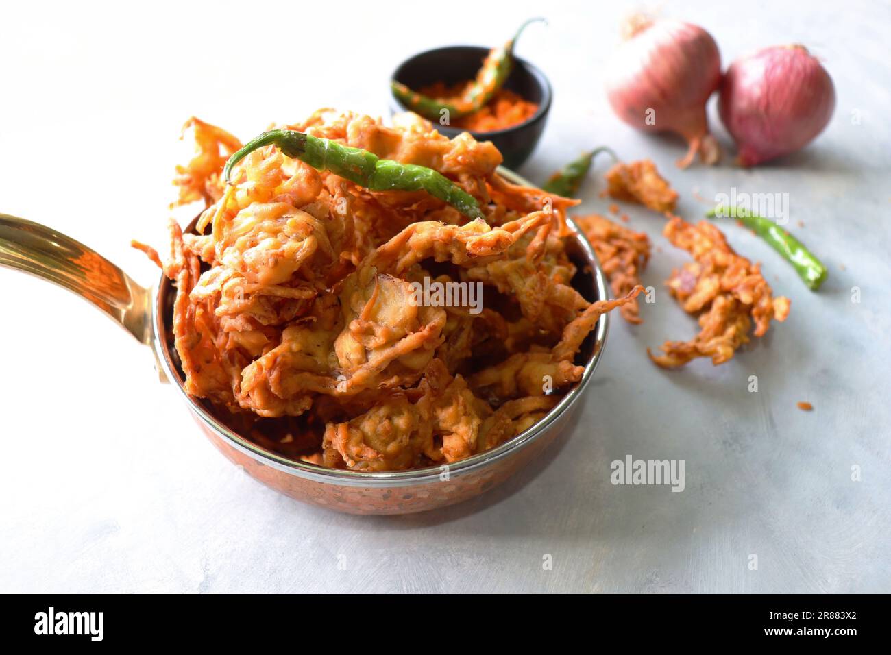 Fried onion pakode or Pyaj ke Pakore also known as Crispy Kanda bhaji ...