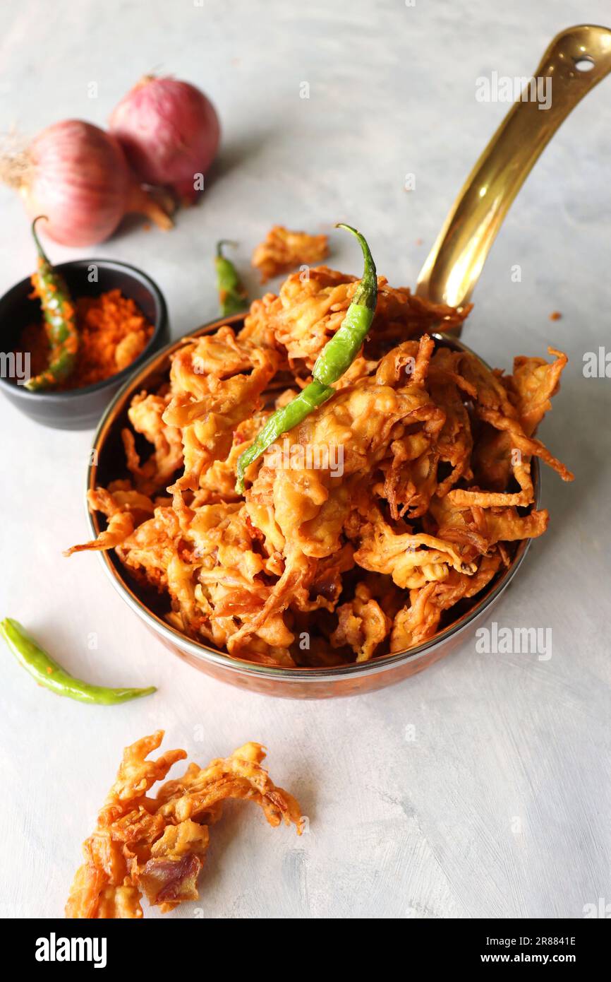 Fried onion pakode or Pyaj ke Pakore also known as Crispy Kanda bhaji ...