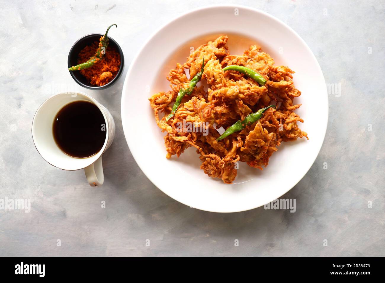 Fried onion pakode or Pyaj ke Pakore also known as Crispy Kanda bhaji ...