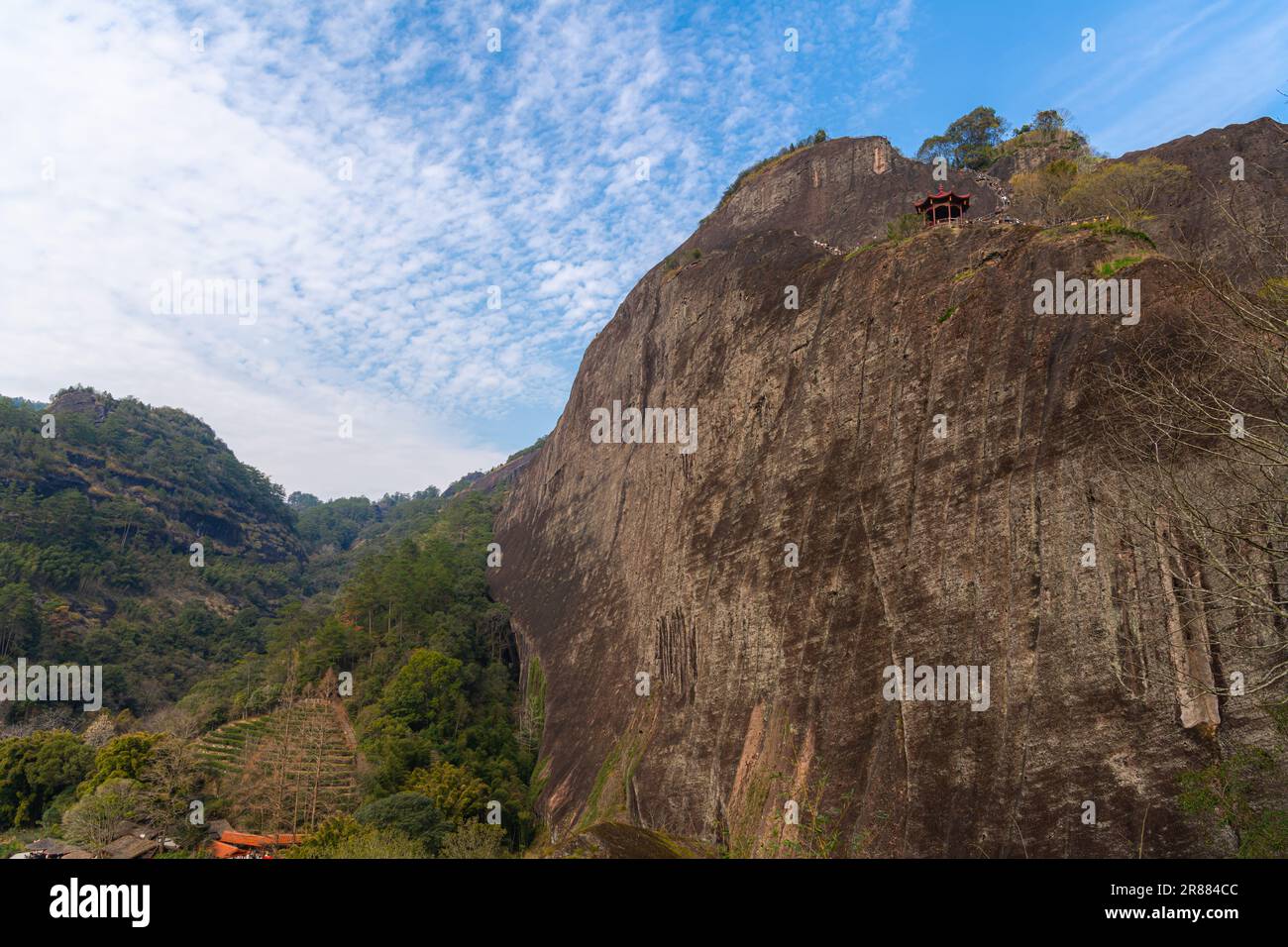 Many people climb to the top of Wuyishan mountain which is the scenery ...