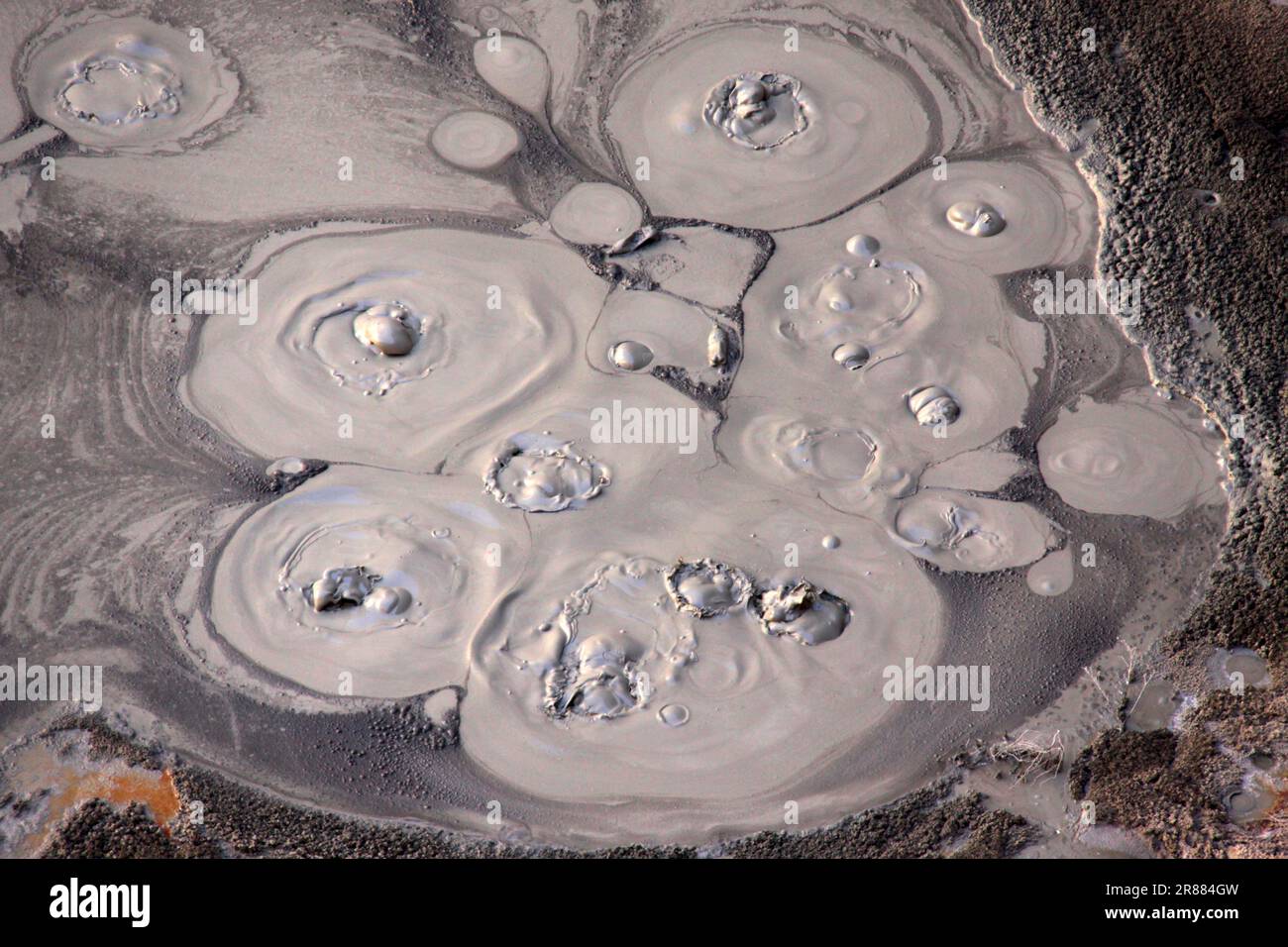 Bubbling mud hole in a gas crater near Darvaz, Karakum Desert ...