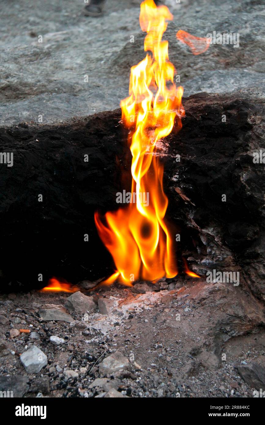 Incessantly, the natural gas flames in Chimera flicker from the ground ...