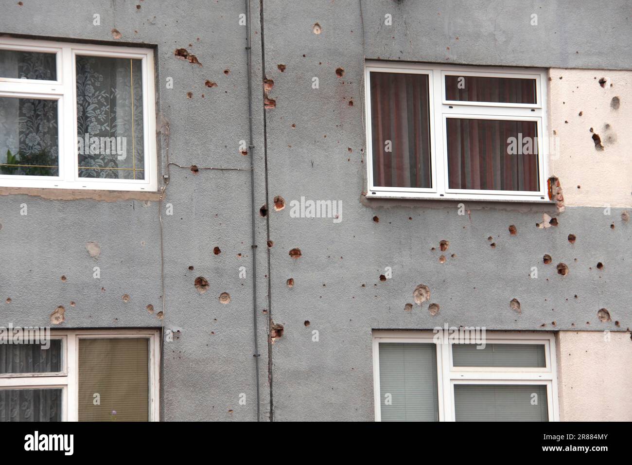 Remembrance of the Bosnian War on a residential building in Bihac ...