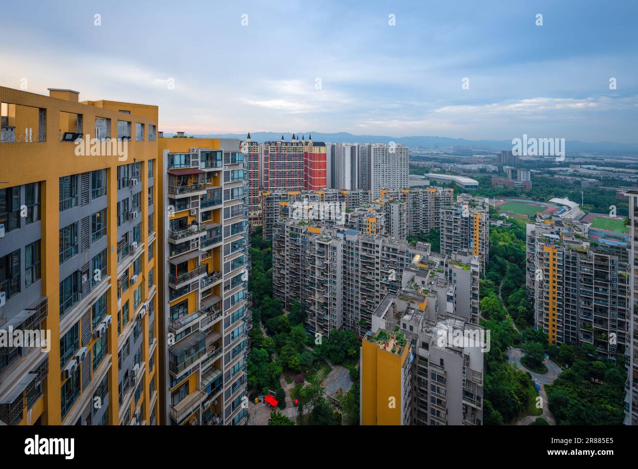 Sunrise, sunlight shining on the residential buildings in Chengdu city ...