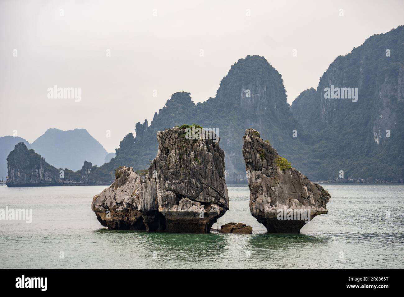 A stunning view of Halong Bay in Vietnam, Southeast Asia with mountains ...