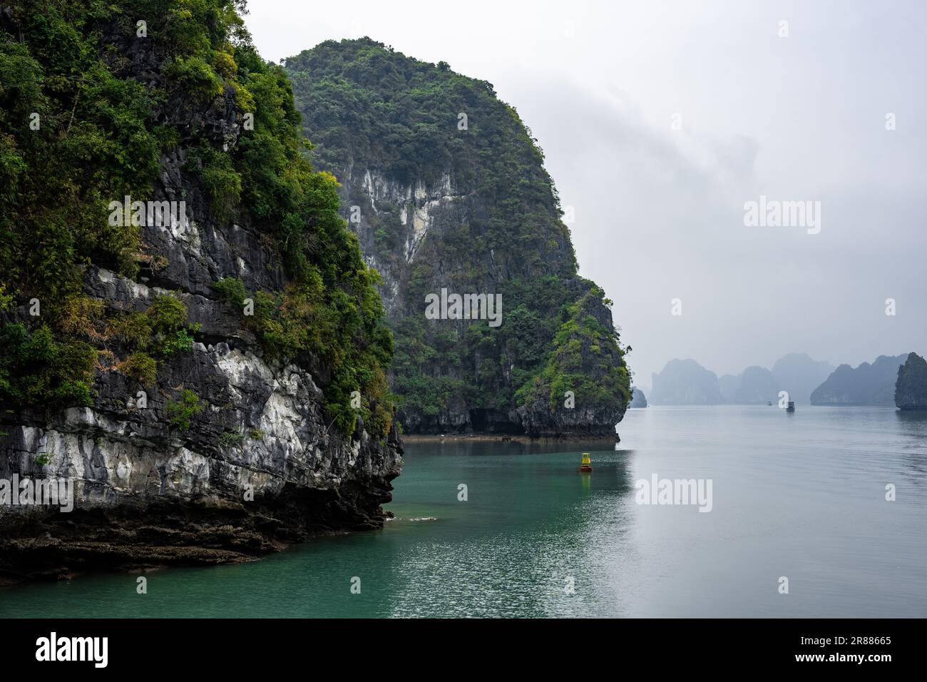 A stunning view of Halong Bay in Vietnam, Southeast Asia with mountains ...