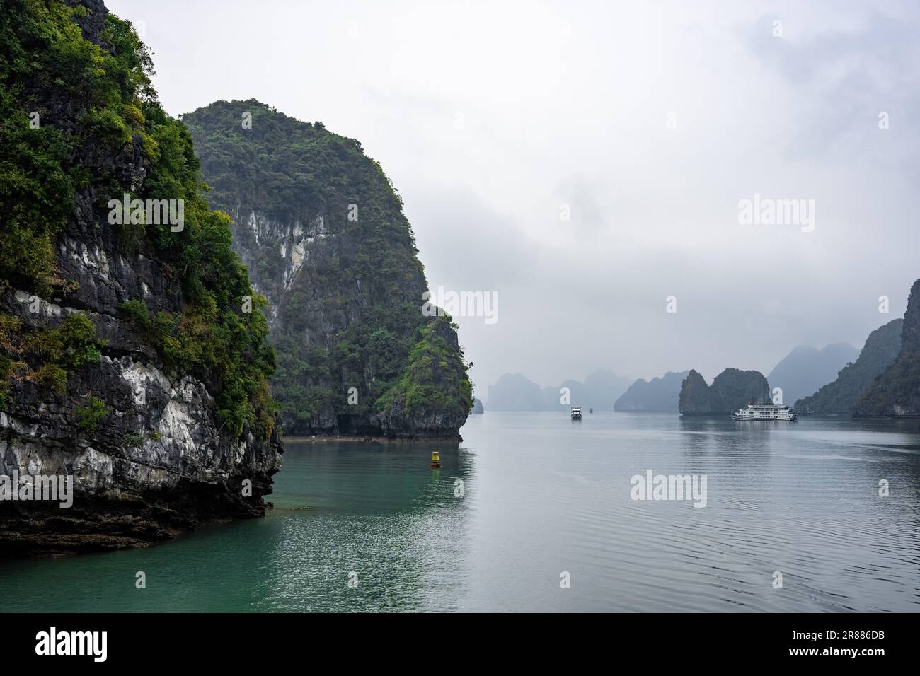 A stunning view of Halong Bay in Vietnam, Southeast Asia with mountains ...