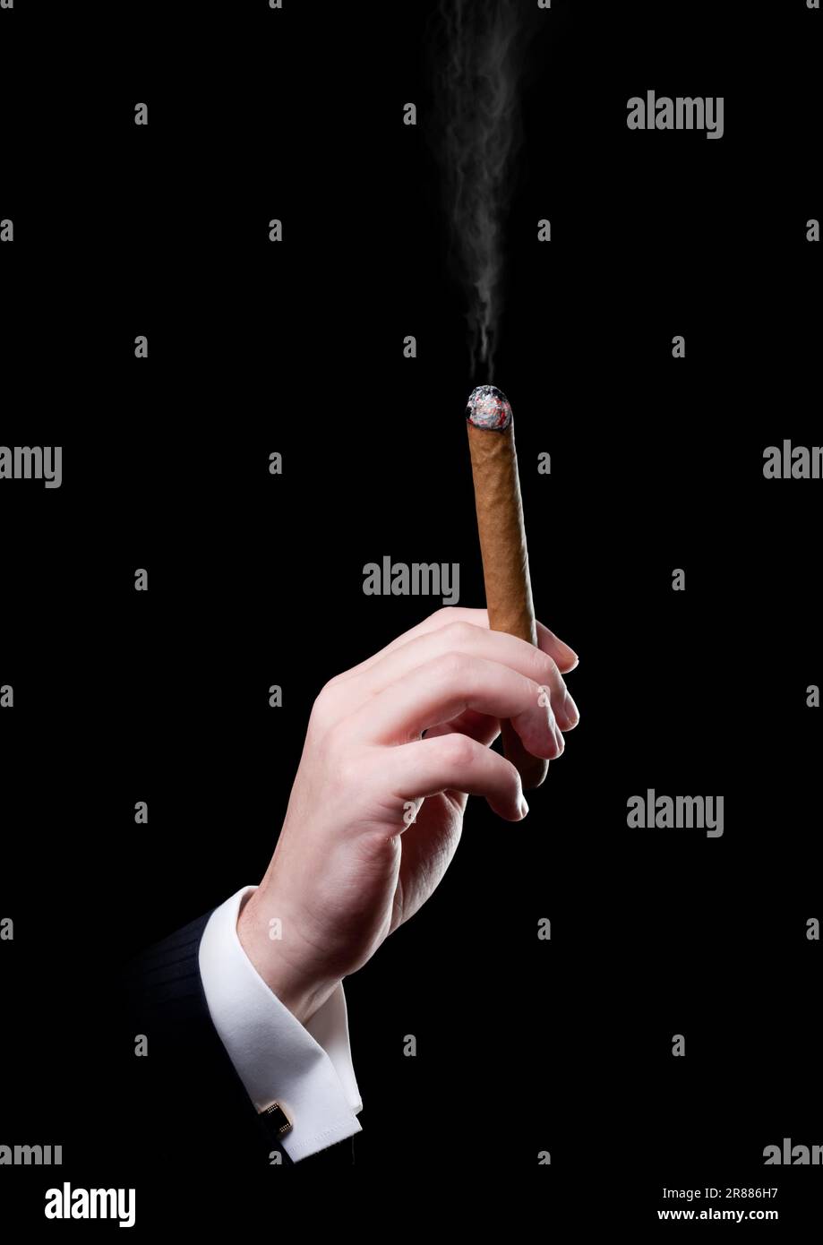 cigar smoking over black Stock Photo - Alamy