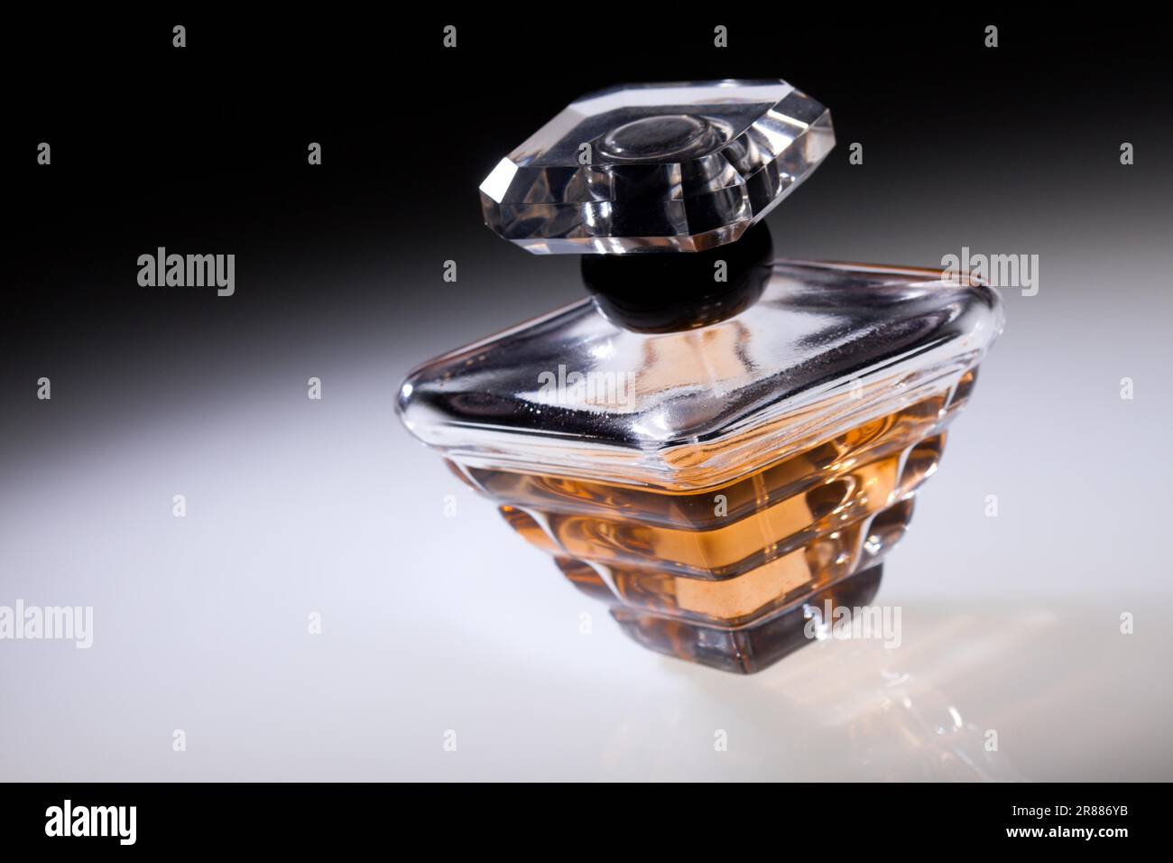 Bottle of perfume on abstract black and white background Stock Photo ...