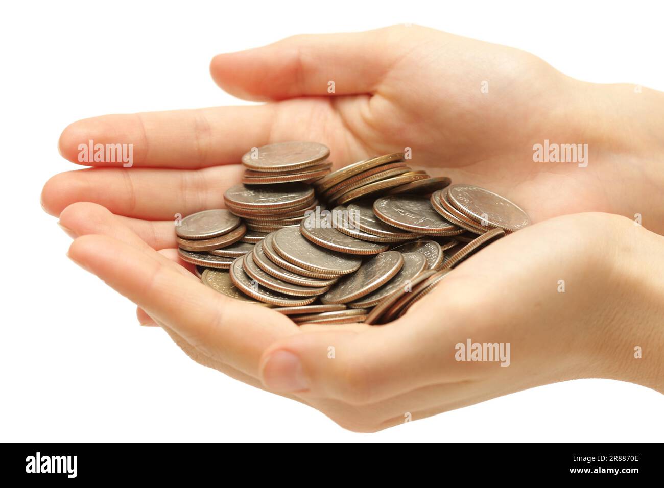 Silver coins in hands isolated on white background Stock Photo - Alamy
