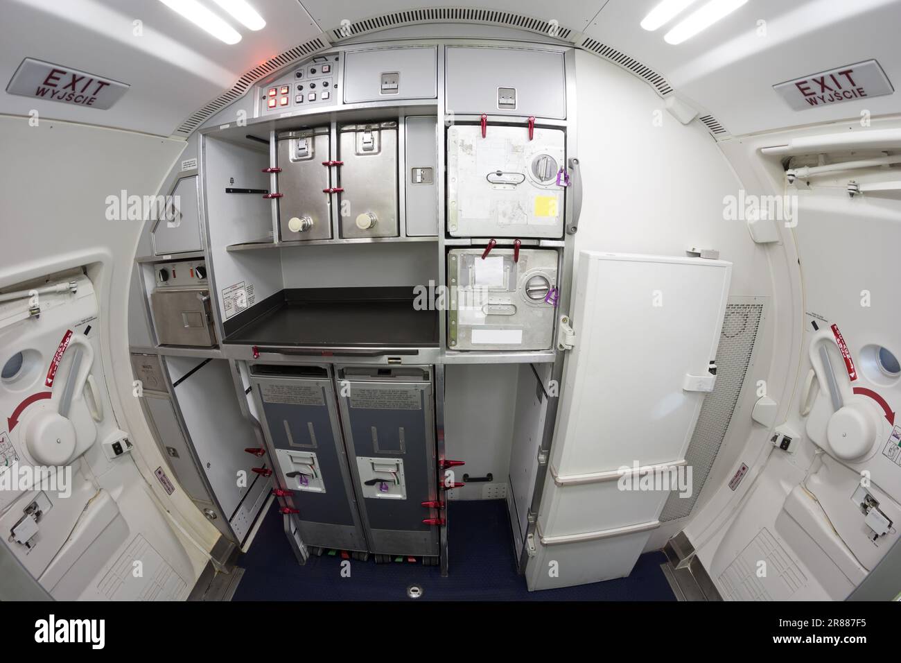 An interior design of back galley of an airplane Stock Photo - Alamy