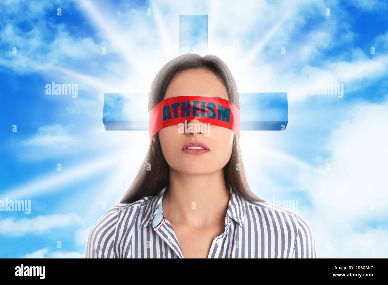 Woman wearing red blindfold with word Atheism, sky with clouds and ...
