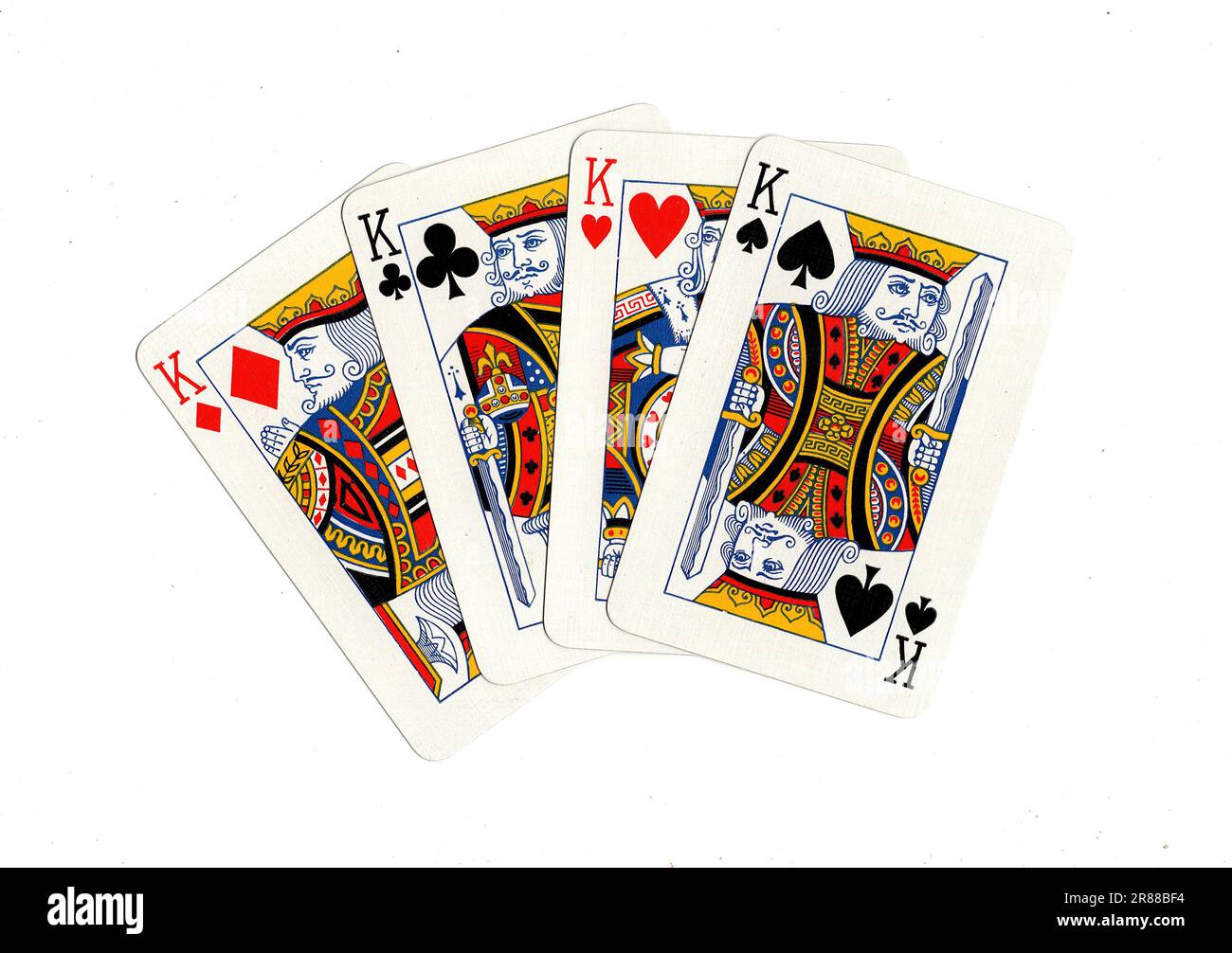 A fan of vintage playing cards featuring kings on a white background ...
