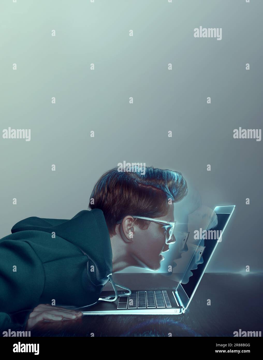 Internet addiction. Teenage boy staring at laptop and immersing into ...