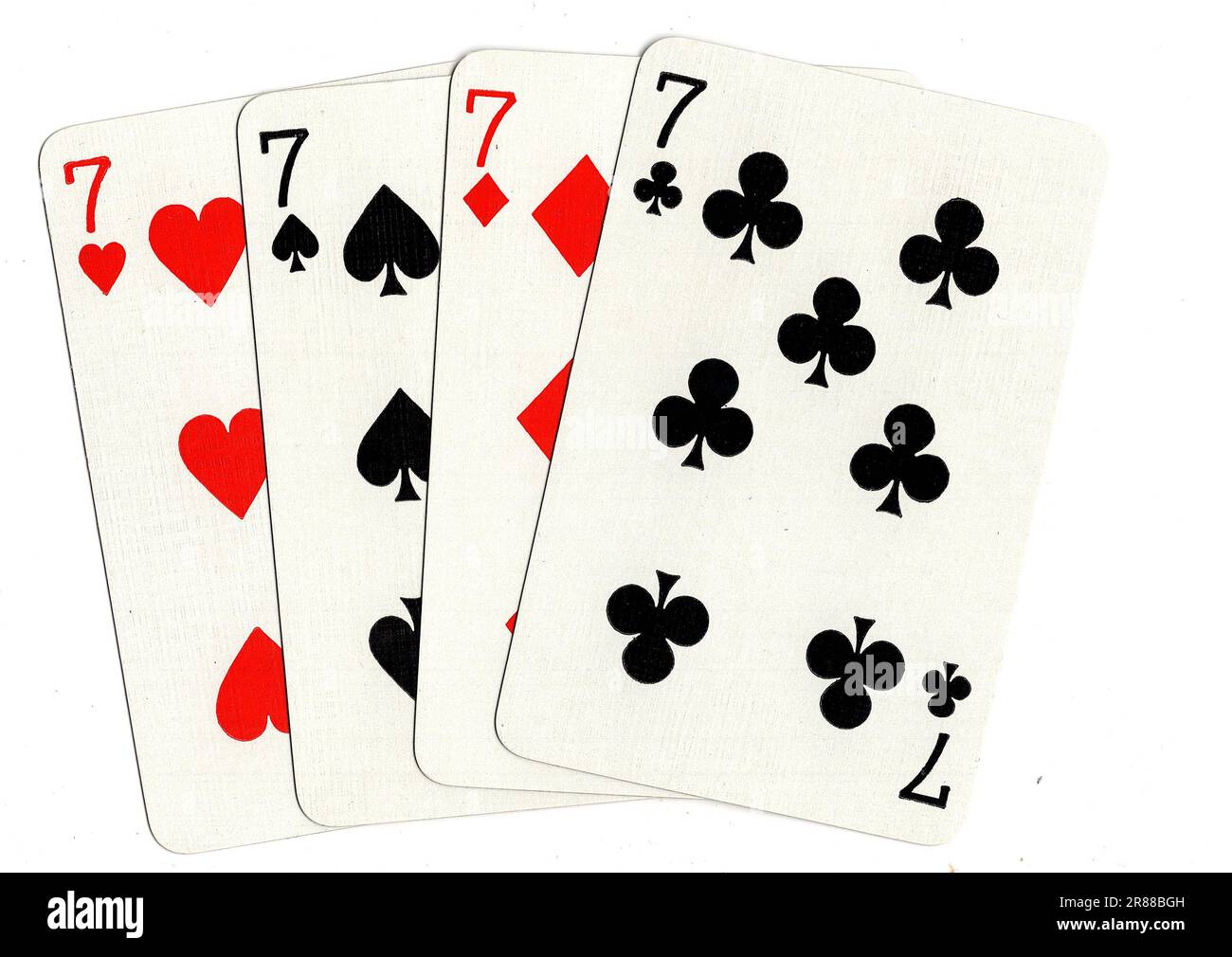 A fan of vintage playing cards featuring sevens on a white background ...