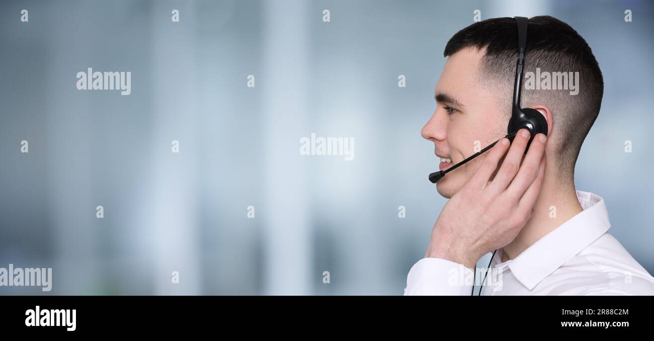 Hotline operator with headset in office, space for text. Banner design ...