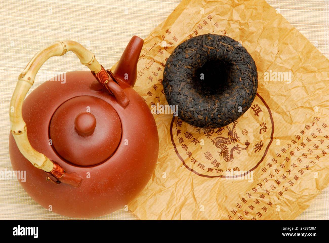 Teapot and pressed black tea, black, China Stock Photo - Alamy