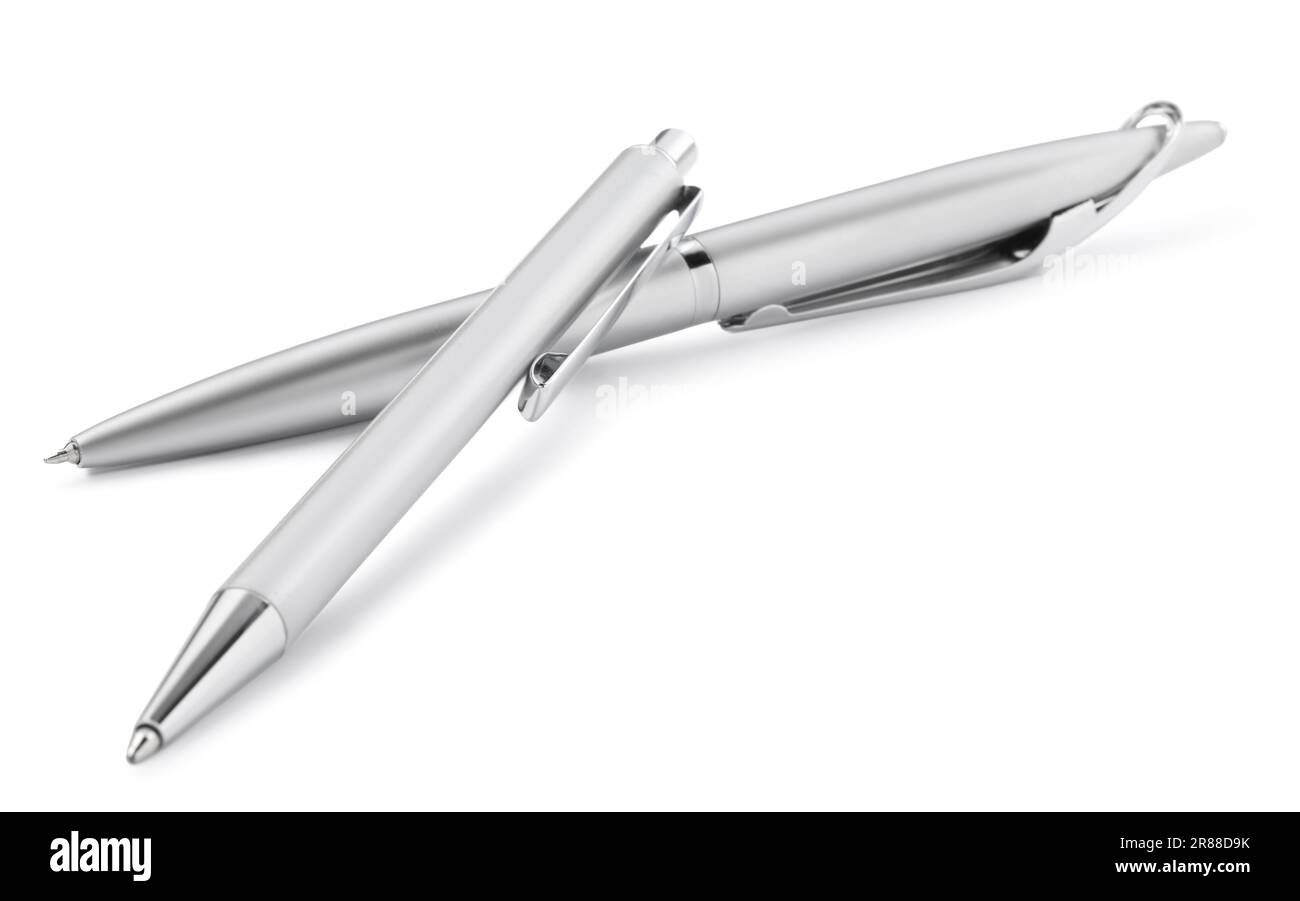 New stylish silver pens isolated on white Stock Photo - Alamy