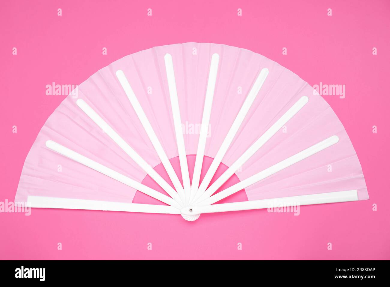 Stylish white hand fan on pink background, top view Stock Photo - Alamy
