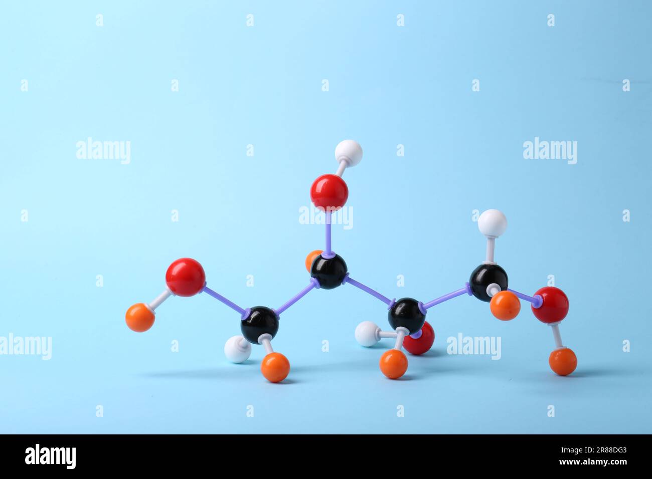 Molecule of sugar on light blue background. Chemical model Stock Photo ...