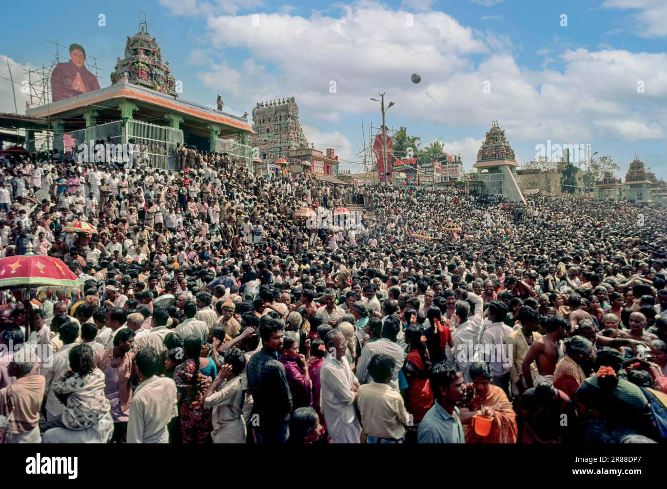Sprinkling of Brahmma theertham (sacrad water) to the people during ...