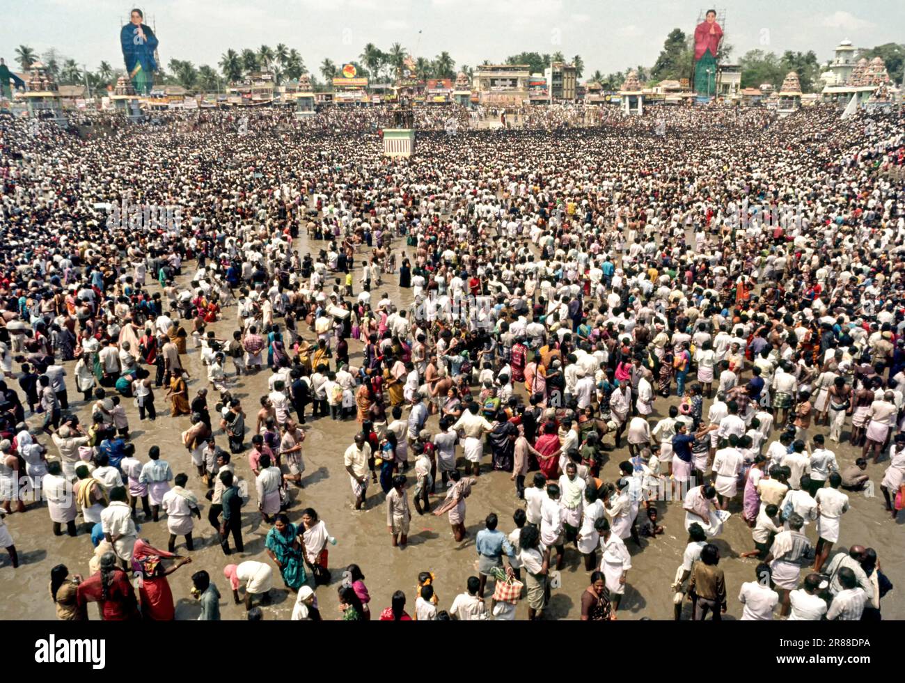 Sprinkling of Brahmma theertham (sacrad water) to the people during ...