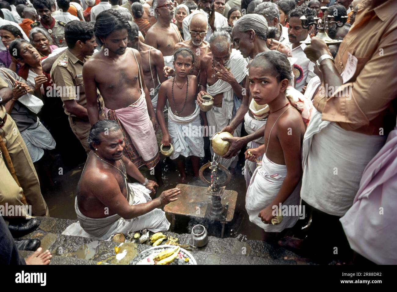 Idol of Lord Siva being bathed during Mahamakham Mahamaham Mahamagam ...