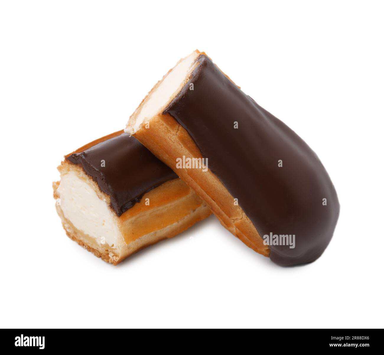 Cut delicious eclair covered with chocolate isolated on white Stock ...