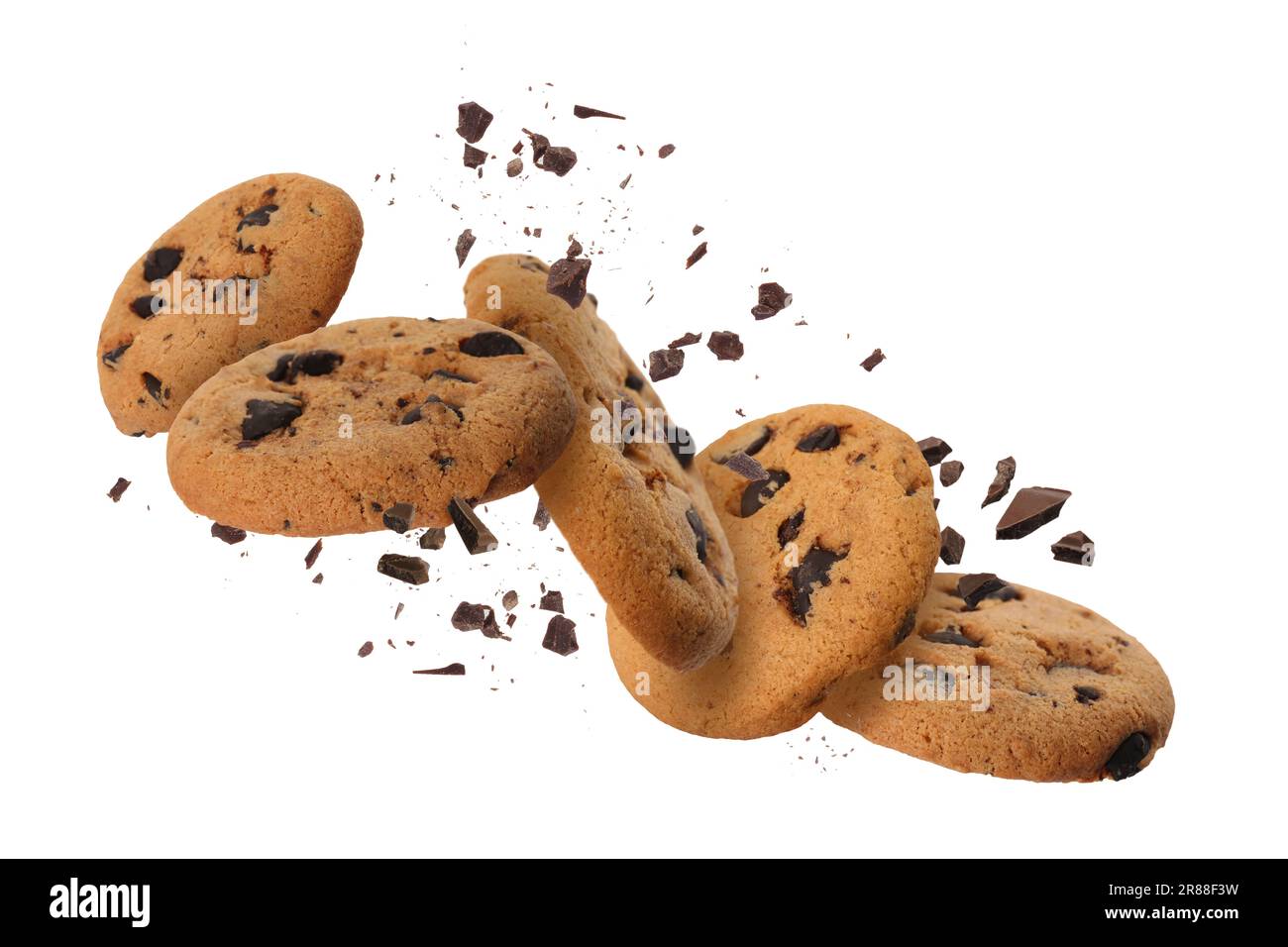 Tasty chocolate chip cookies falling on white background Stock Photo ...