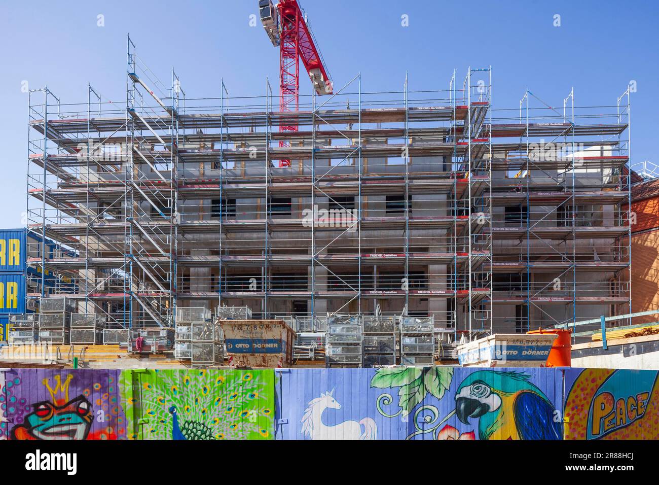 Shell construction, building site, commercial building, colourfully ...