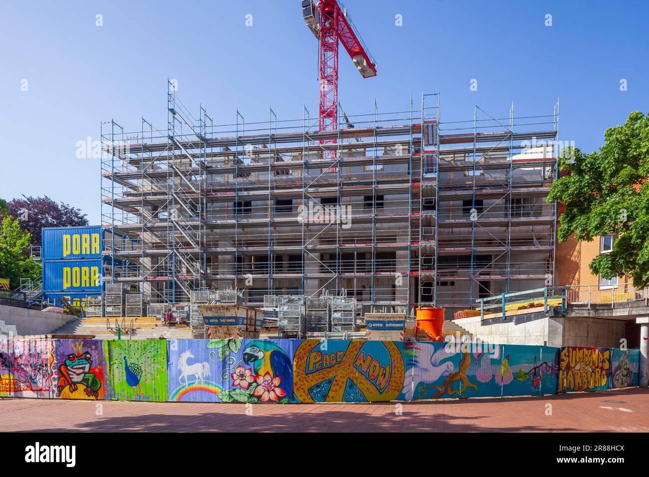 Shell construction, building site, commercial building, colourfully ...