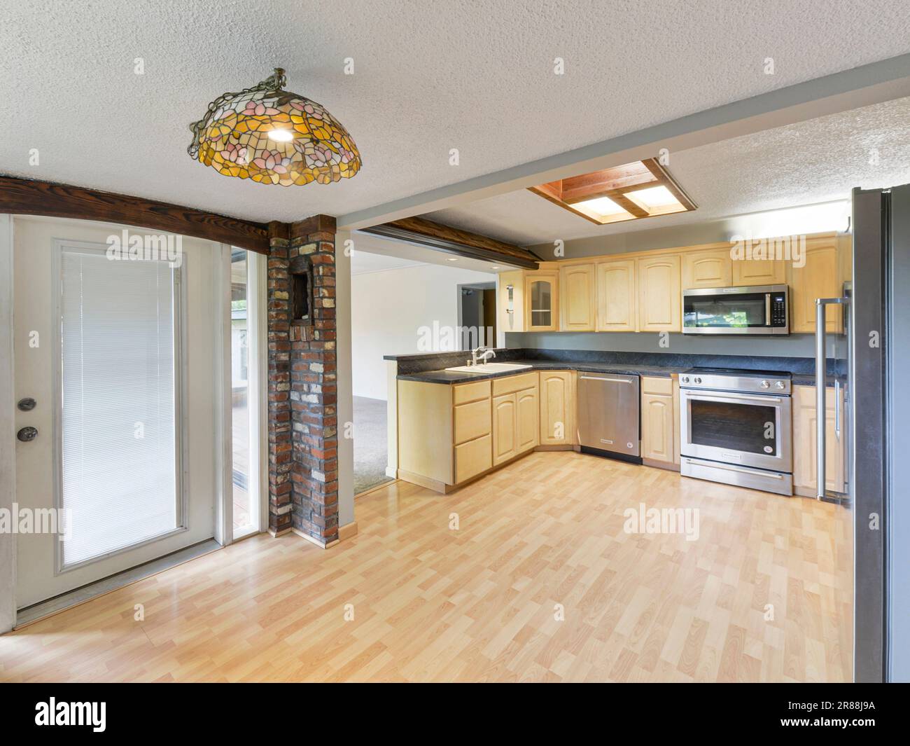 Modern residential empty dining room and kitchen interior Stock Photo ...