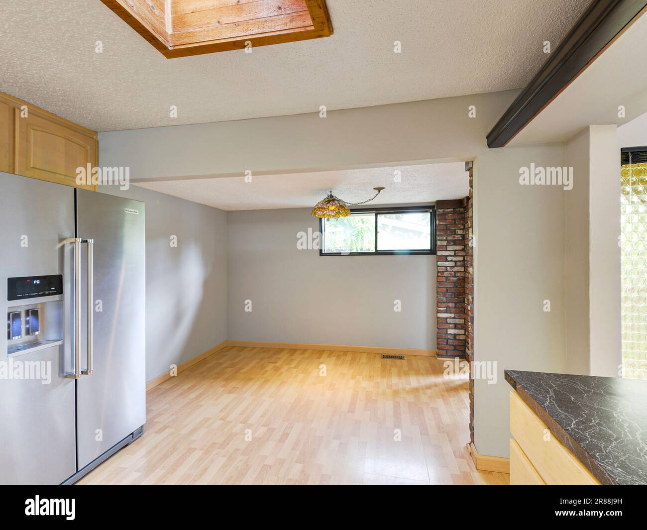 Modern residential empty kitchen and dining room interior Stock Photo ...