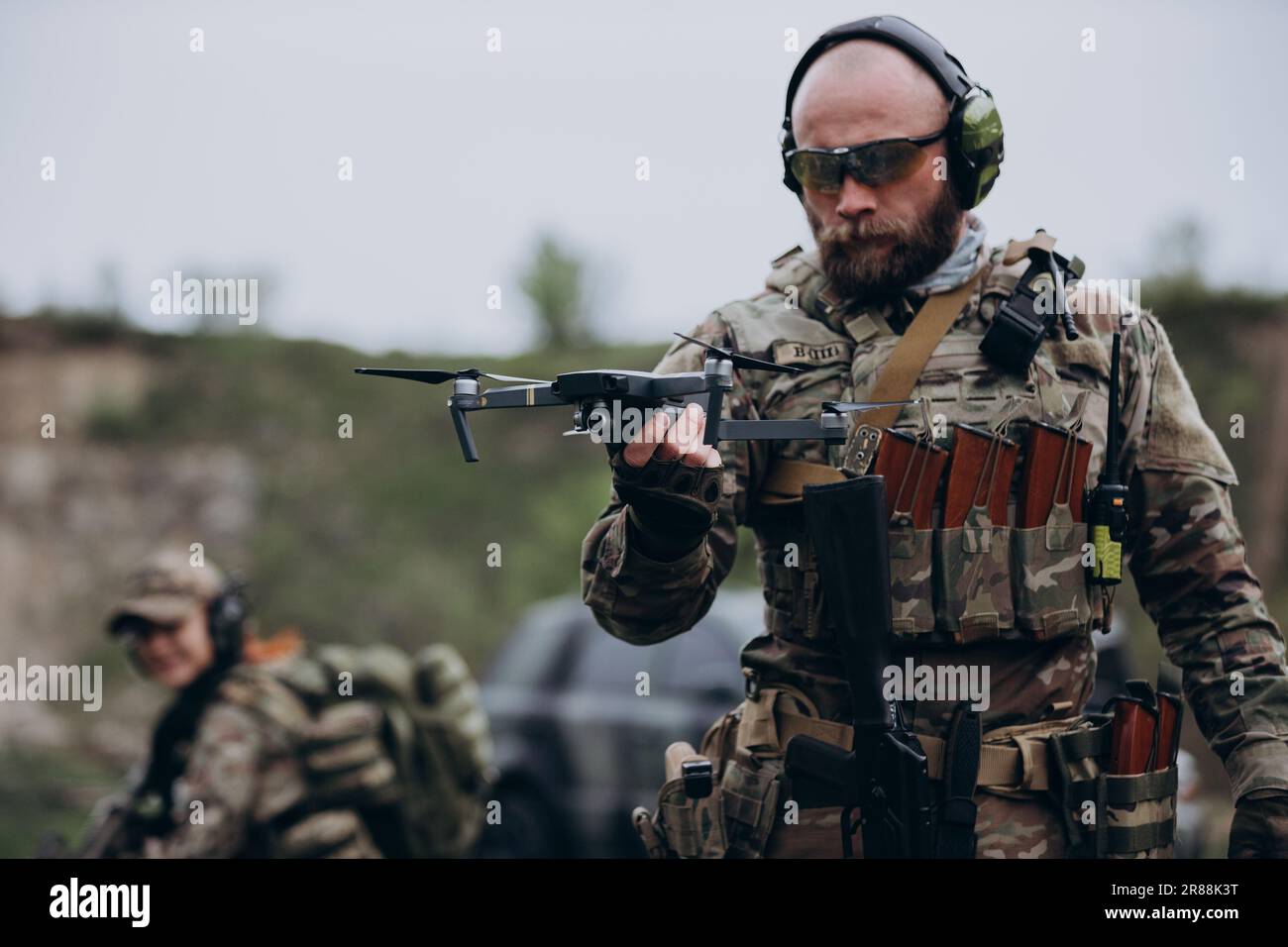 Portrait of Ukrainian military man holding a drone Stock Photo - Alamy